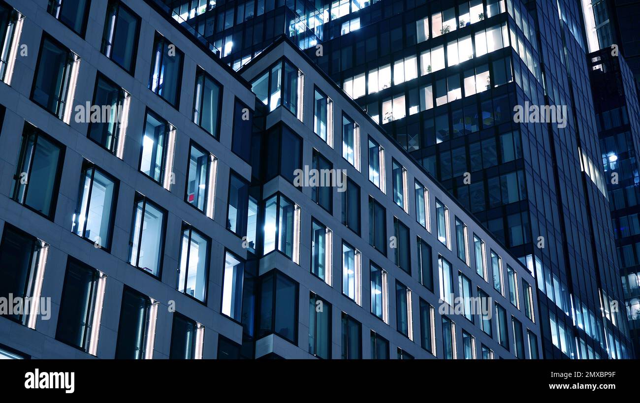 Amazing night cityscape. Office building at night, building facade with ...