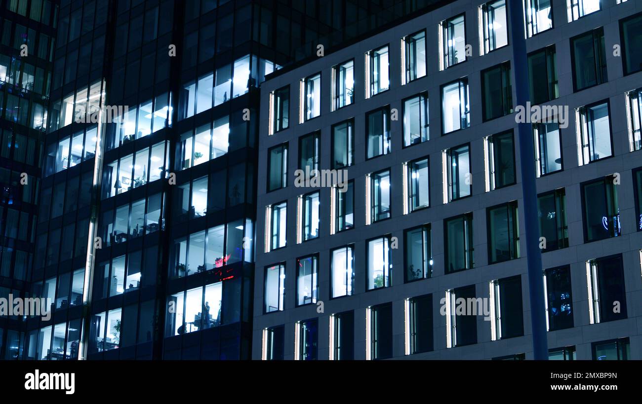 Amazing night cityscape. Office building at night, building facade with ...