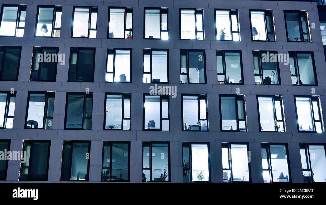 Amazing night cityscape. Office building at night, building facade with ...