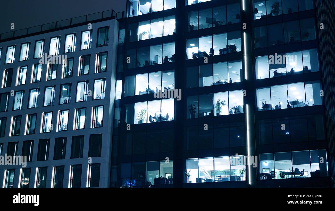 Amazing night cityscape. Office building at night, building facade with ...