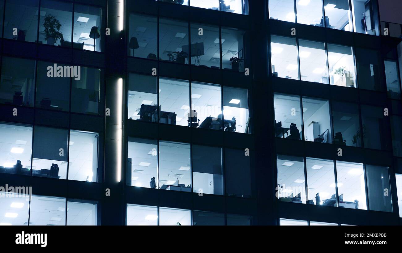 Amazing night cityscape. Office building at night, building facade with ...