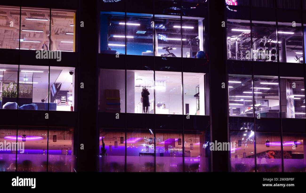 Amazing night cityscape. Office building at night, building facade with ...