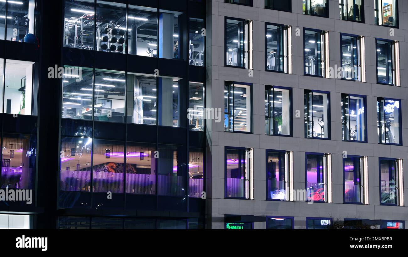 Amazing night cityscape. Office building at night, building facade with ...