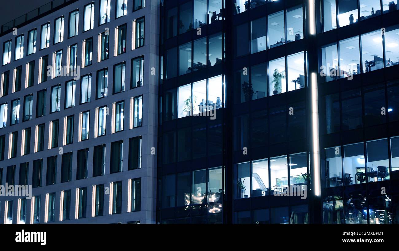 Amazing night cityscape. Office building at night, building facade with ...