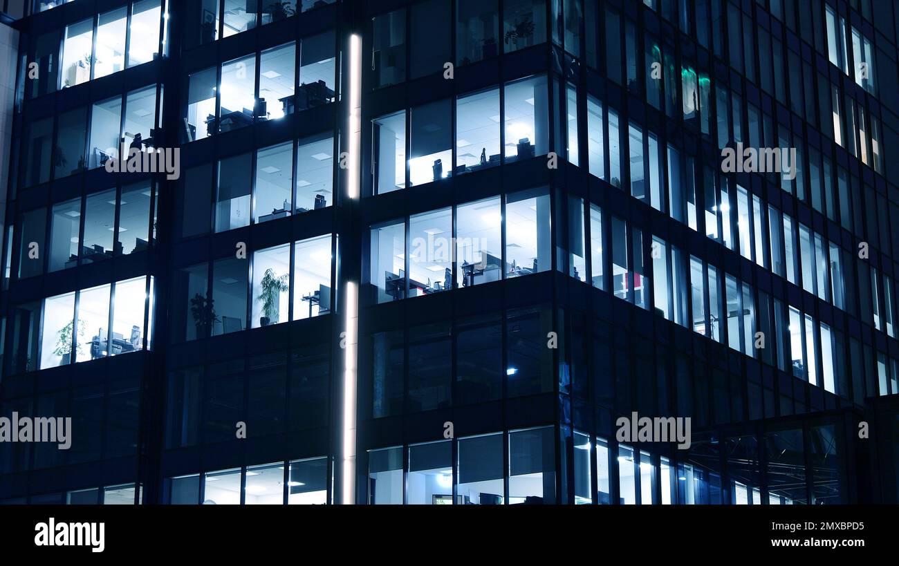 Amazing night cityscape. Office building at night, building facade with ...