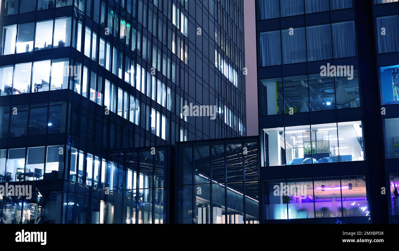 Amazing night cityscape. Office building at night, building facade with ...