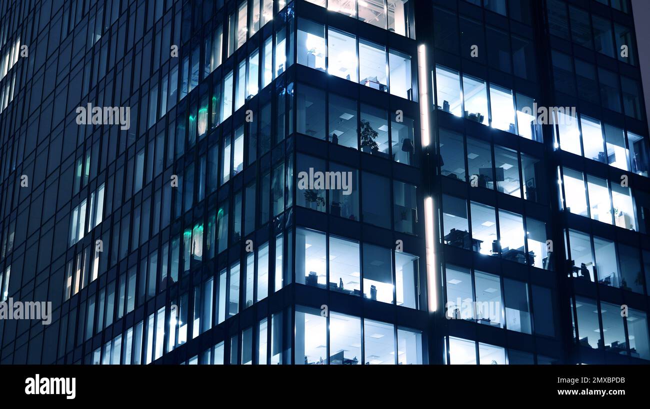 Amazing night cityscape. Office building at night, building facade with ...