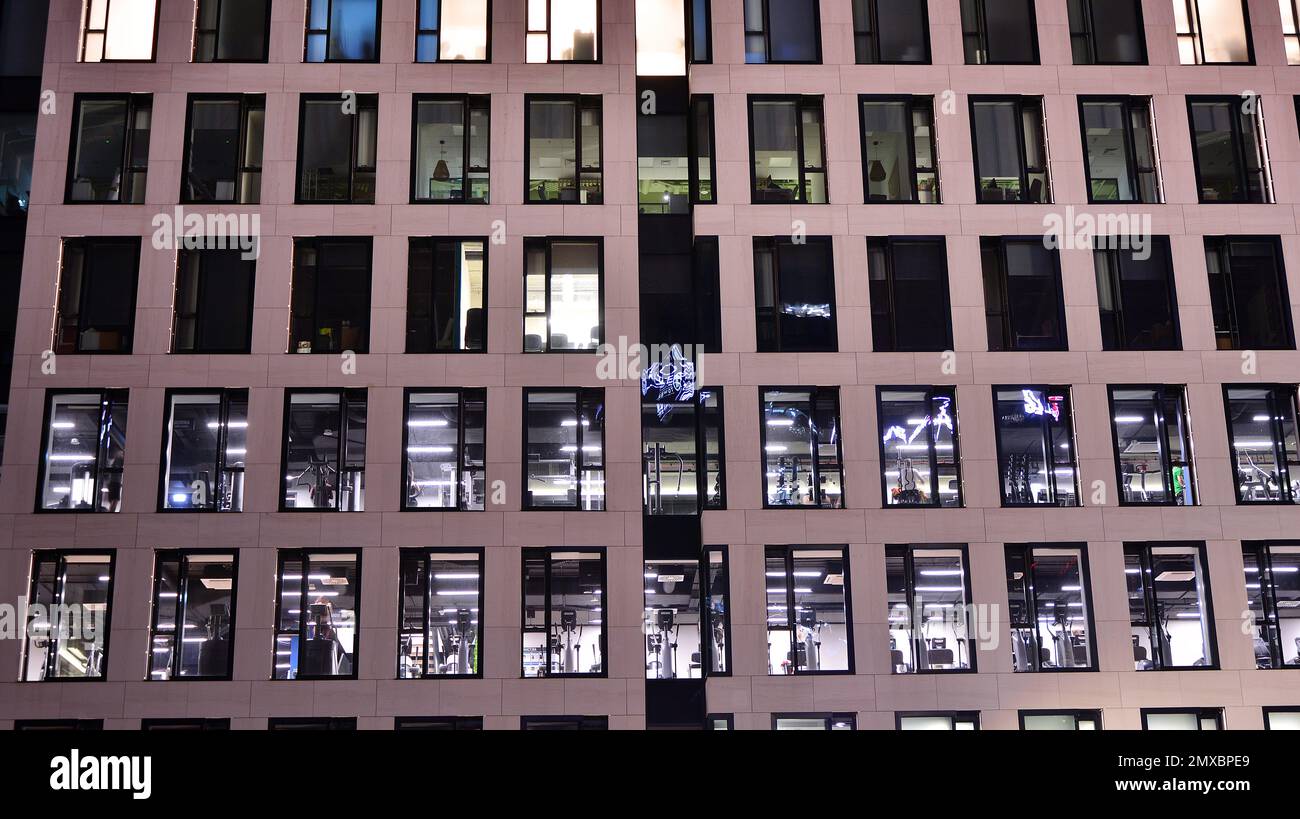 Amazing night cityscape. Office building at night, building facade with ...