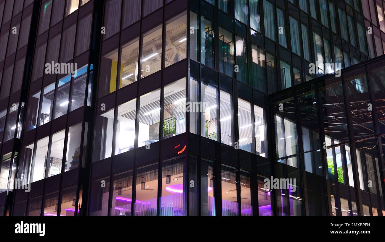 Amazing night cityscape. Office building at night, building facade with ...