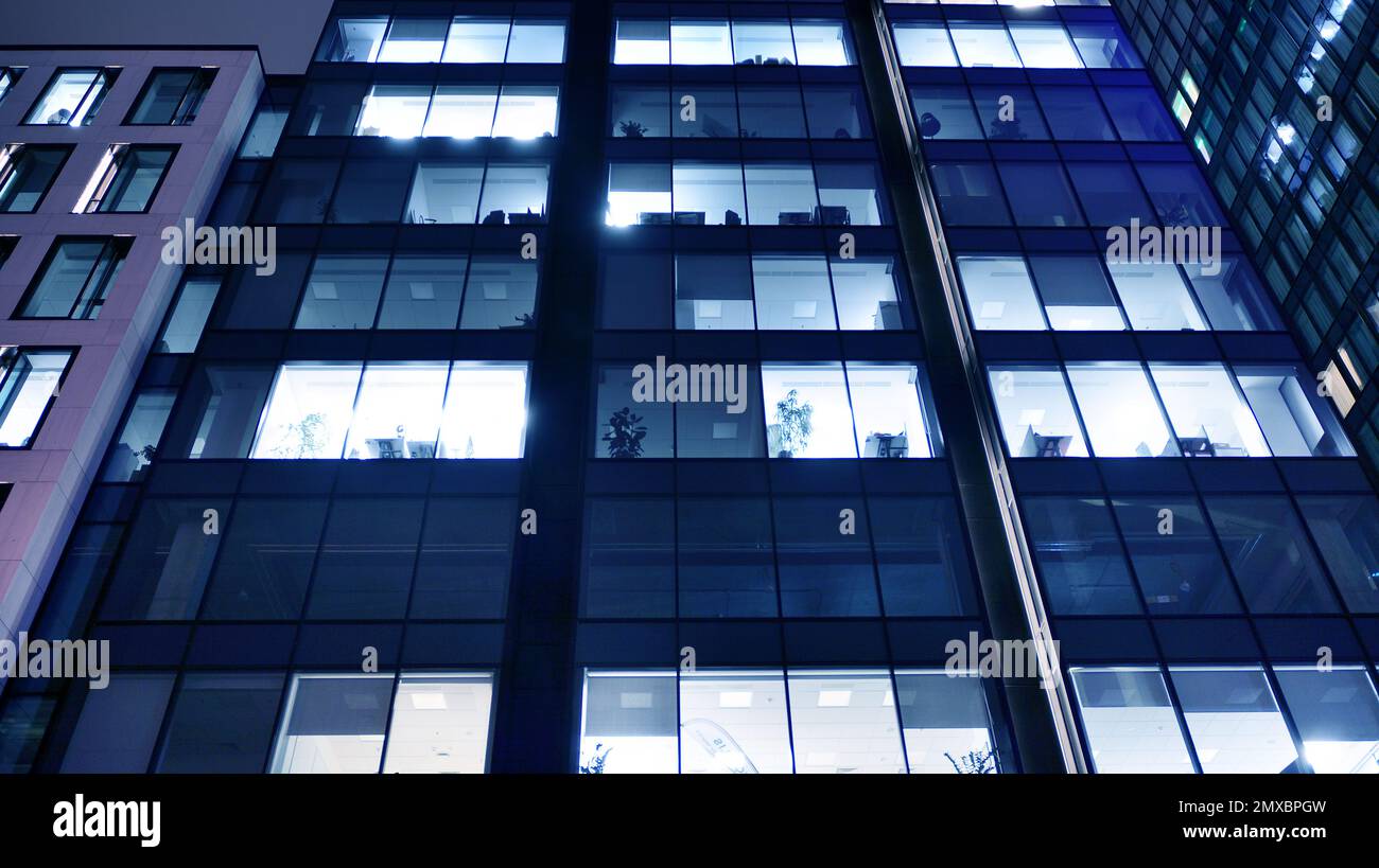 Amazing night cityscape. Office building at night, building facade with ...