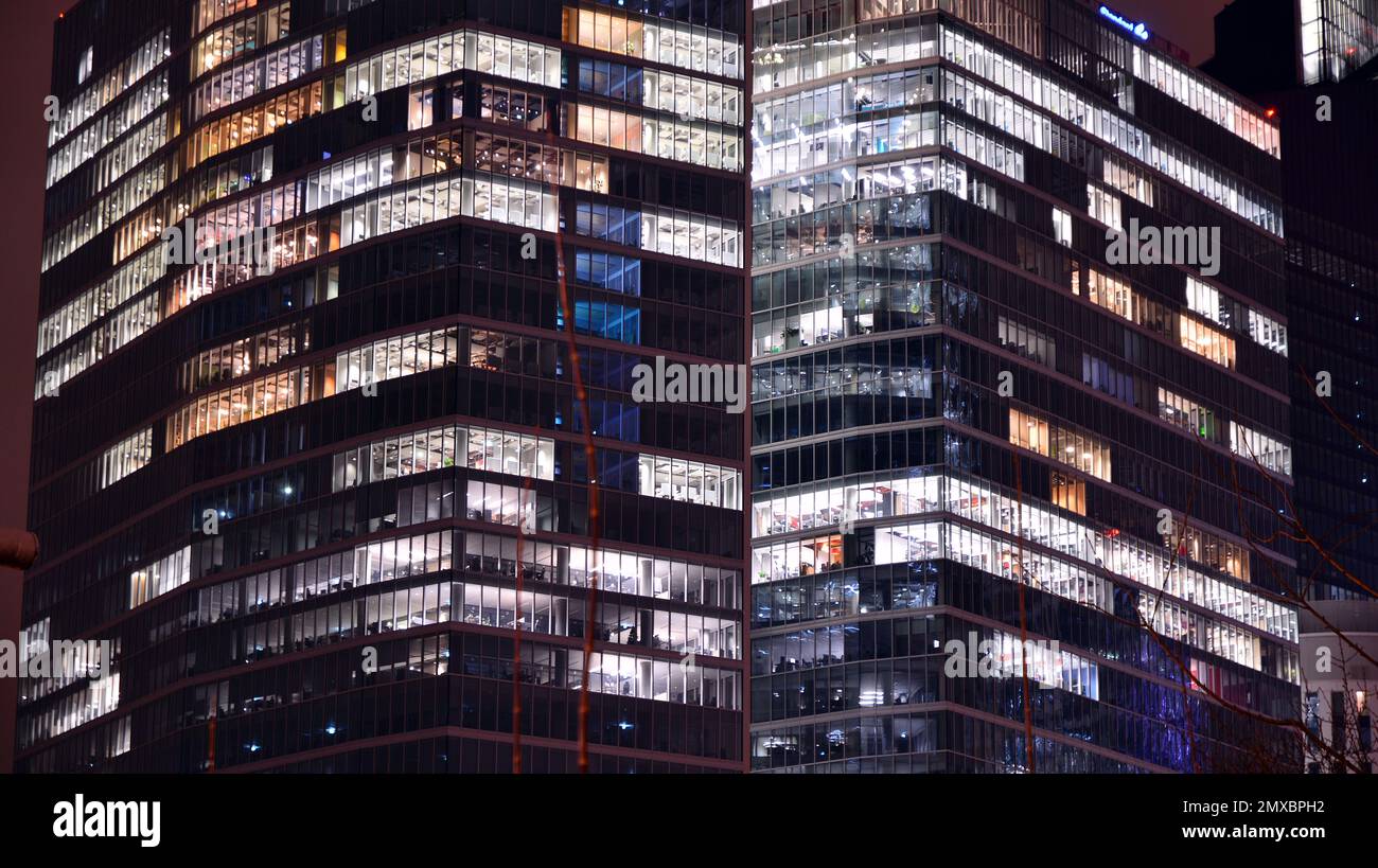Amazing night cityscape. Office building at night, building facade with ...