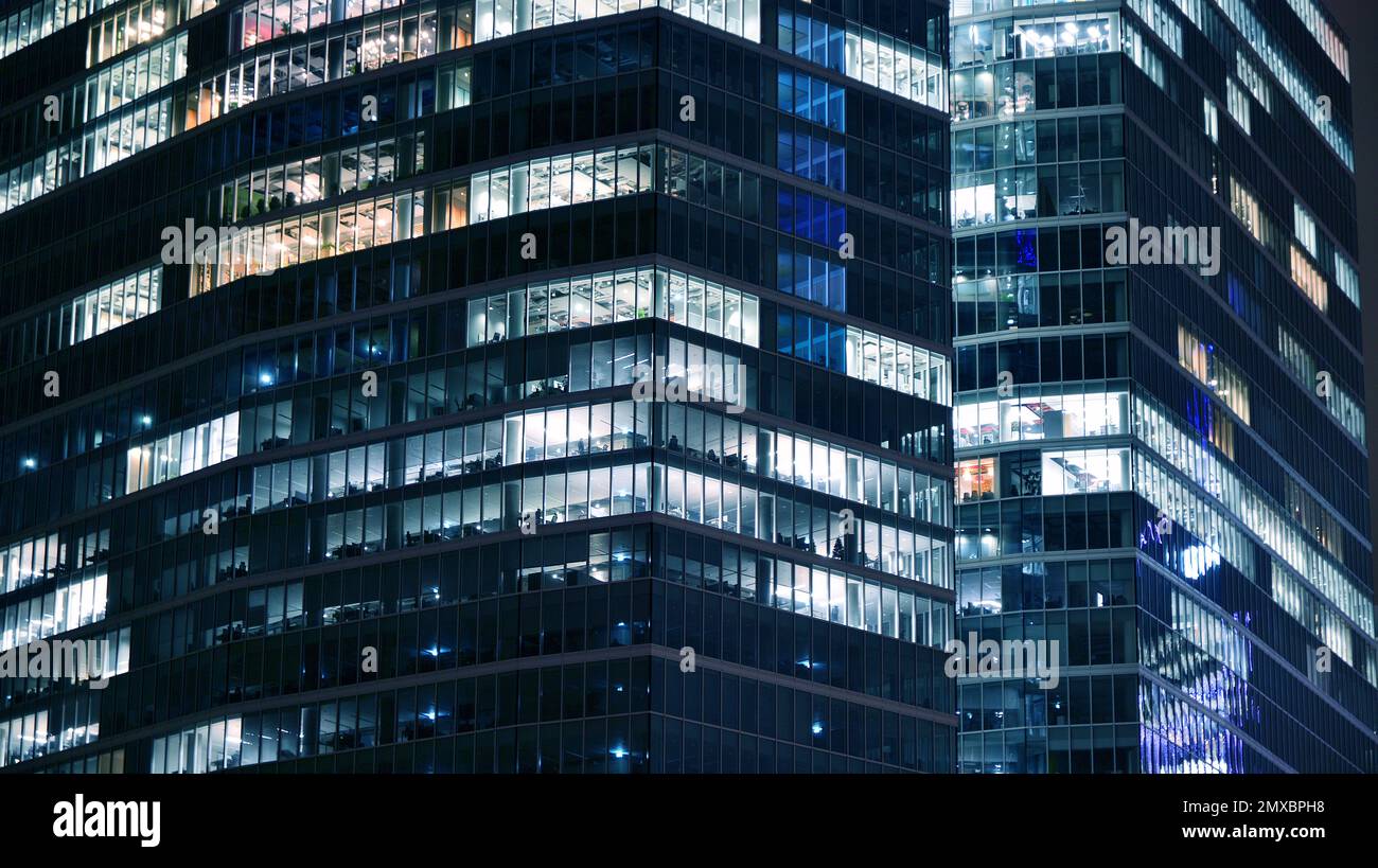 Amazing night cityscape. Office building at night, building facade with ...