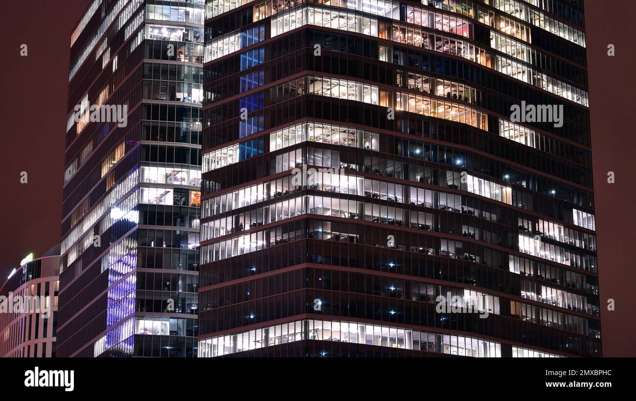 Amazing night cityscape. Office building at night, building facade with ...