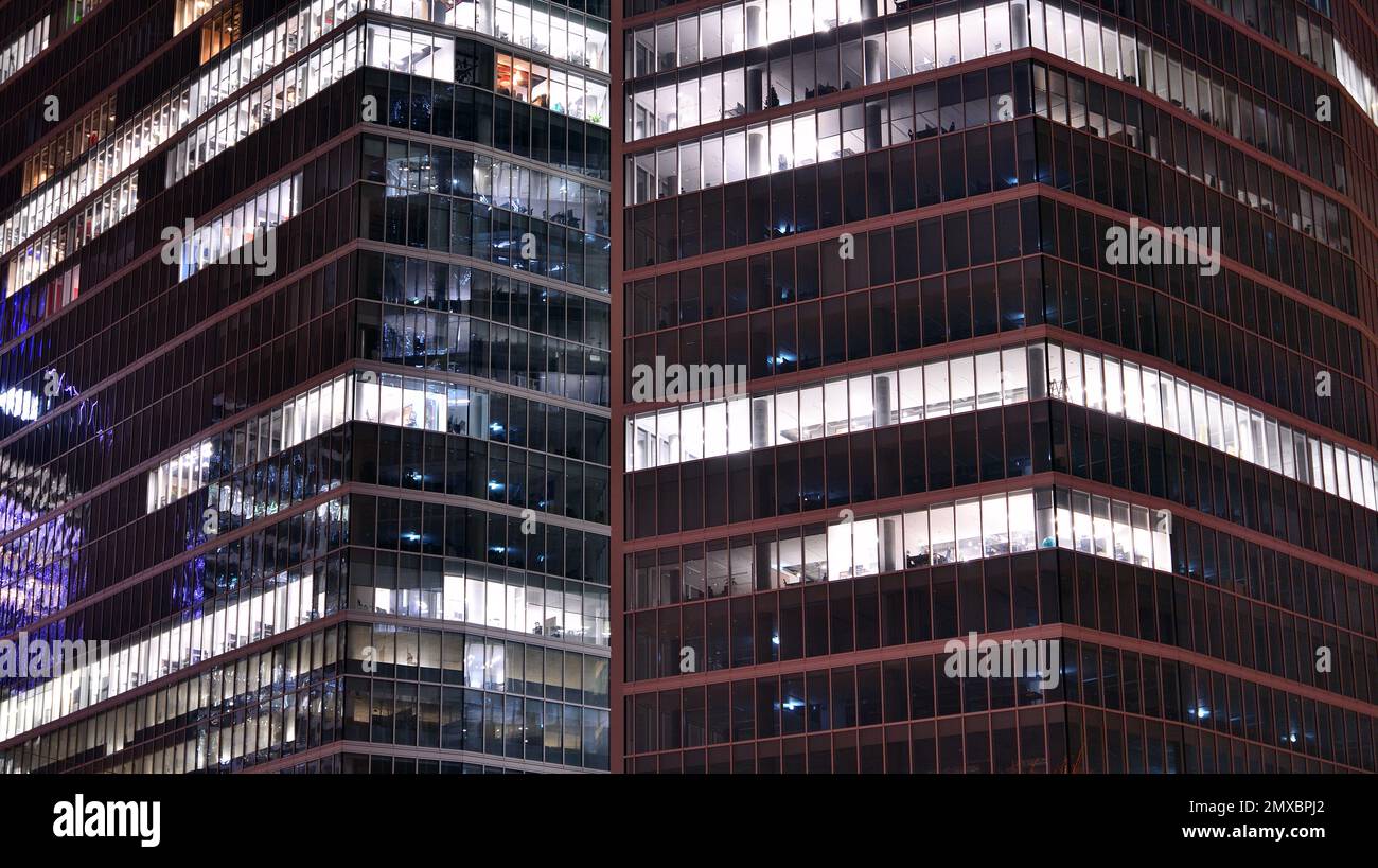 Amazing night cityscape. Office building at night, building facade with ...
