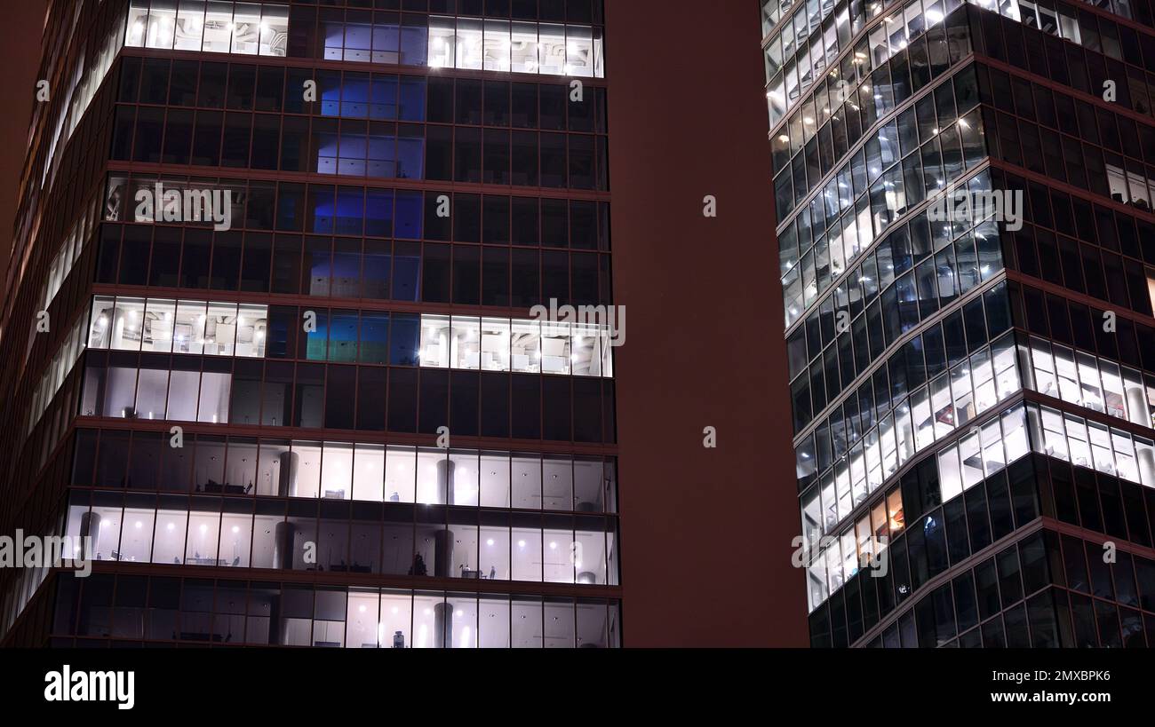 Amazing night cityscape. Office building at night, building facade with ...