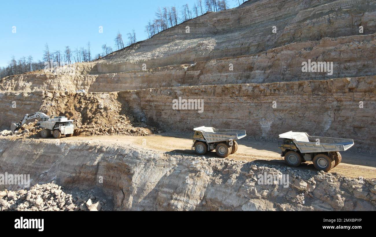 Excavator loading soil hi-res stock photography and images - Alamy