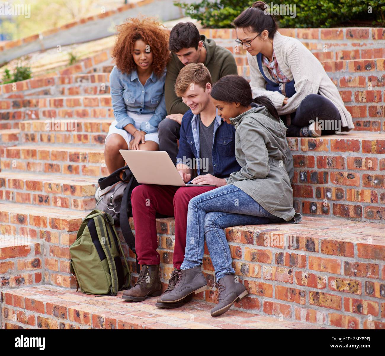 Alone we are smart, together we are brilliant. a group of students ...