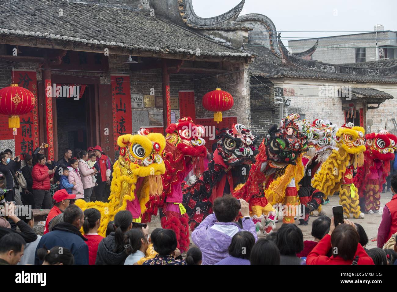 Villagers perform traditional dragon dance to celebrate the Lantern Festival in Wentang Village ...