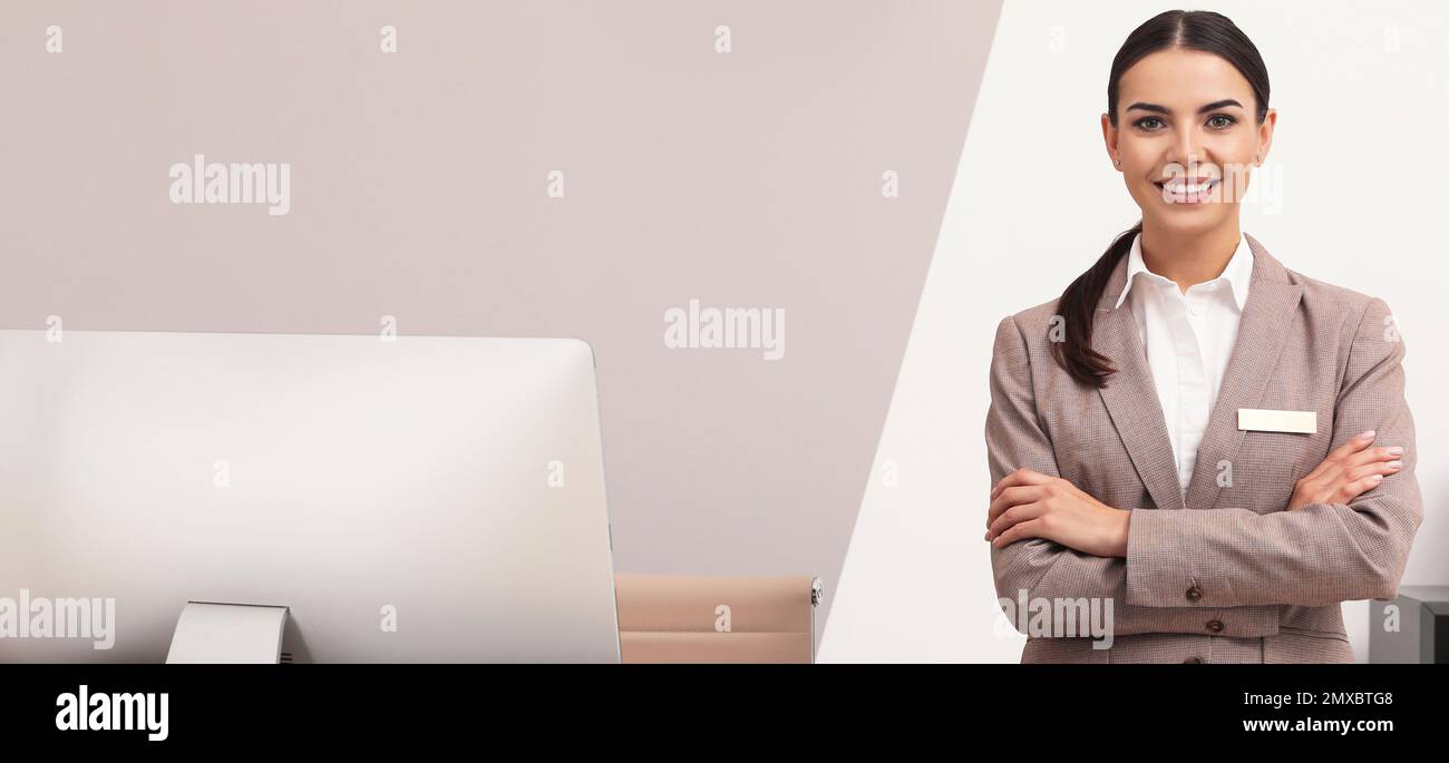 Portrait of receptionist in modern hotel. Banner design Stock Photo - Alamy