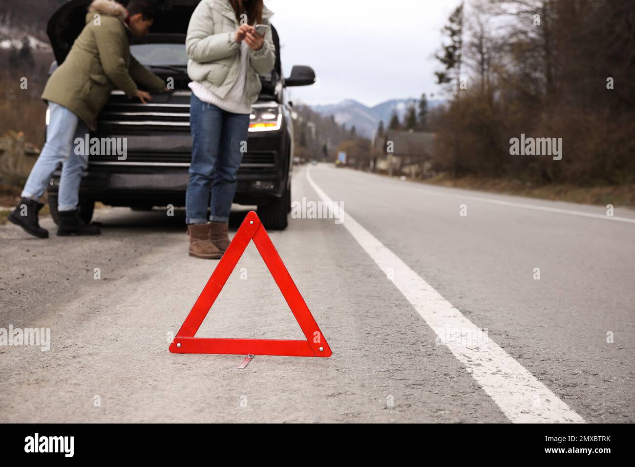 Car near stop sign hi-res stock photography and images - Alamy
