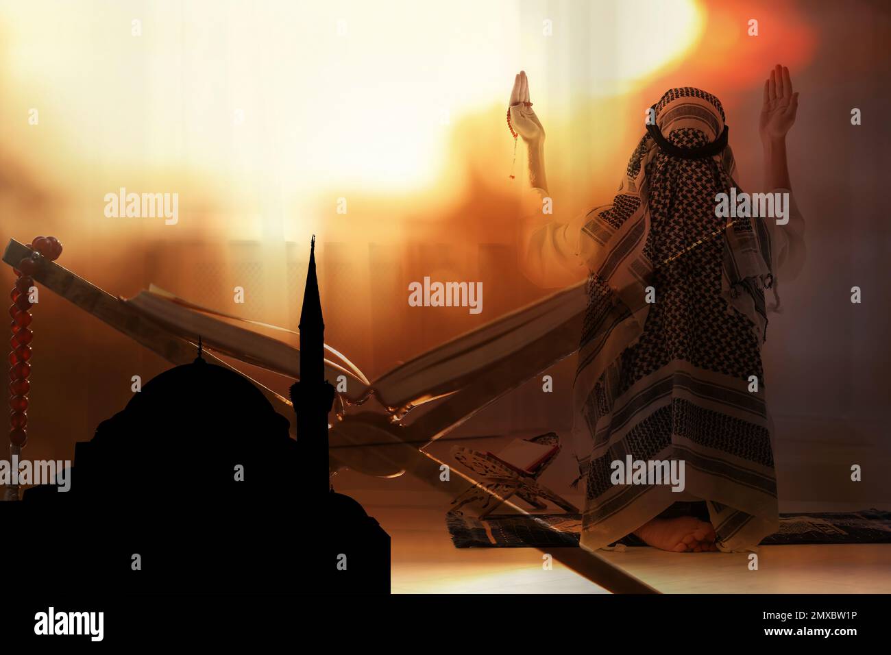 Multiple exposure of Muslim man praying, silhouette of mosque and stand ...