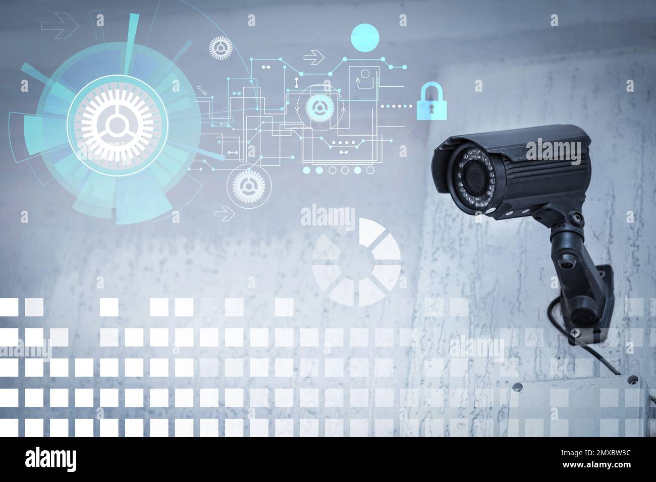 Modern CCTV security camera on white building wall outdoors and digital ...