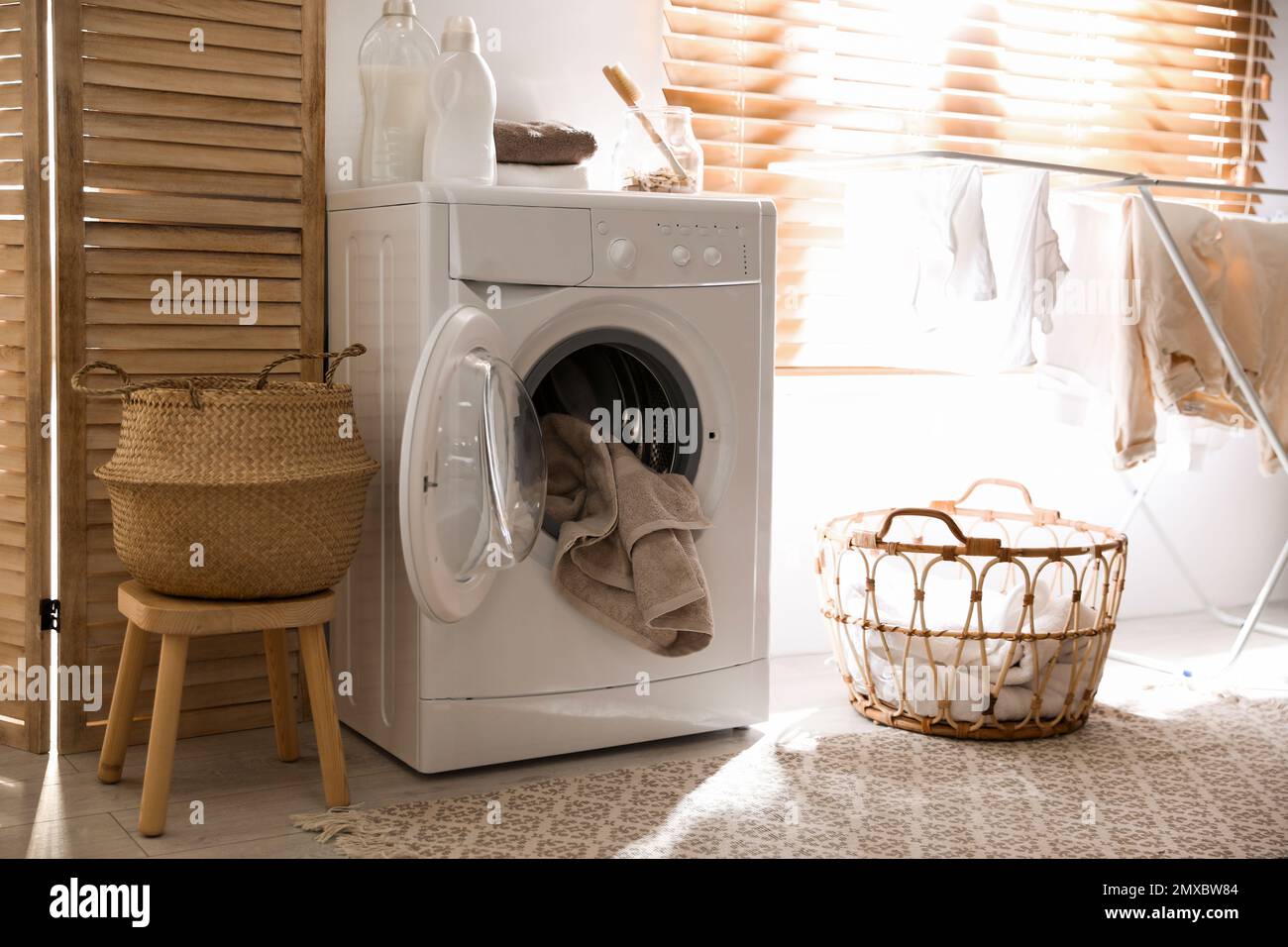 Stylish room interior with washing machine. Design idea Stock Photo - Alamy