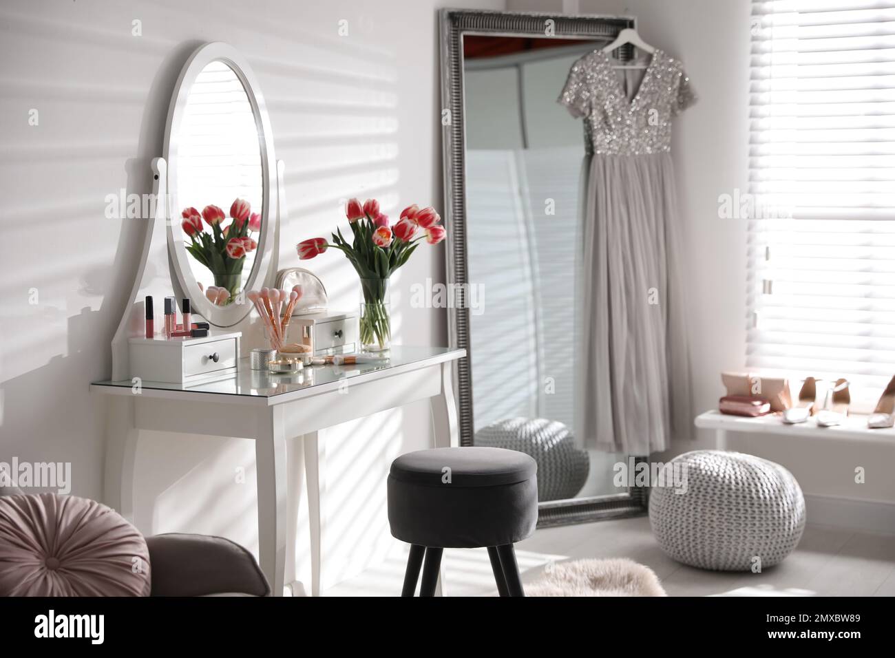 Stylish room interior with elegant dressing table and mirror Stock ...