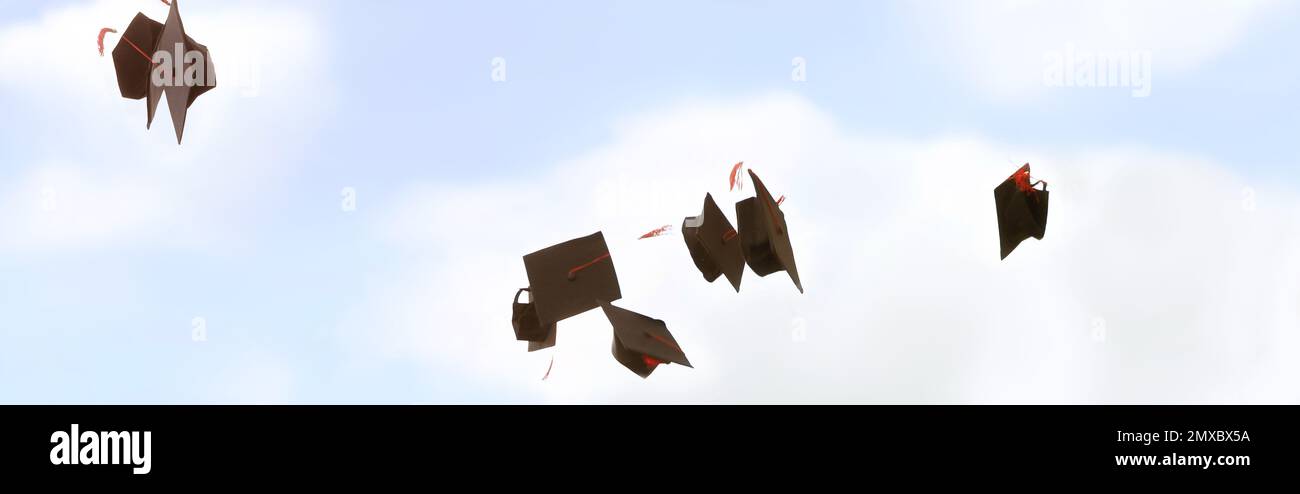 Graduation hats in air outdoors. Banner design Stock Photo - Alamy