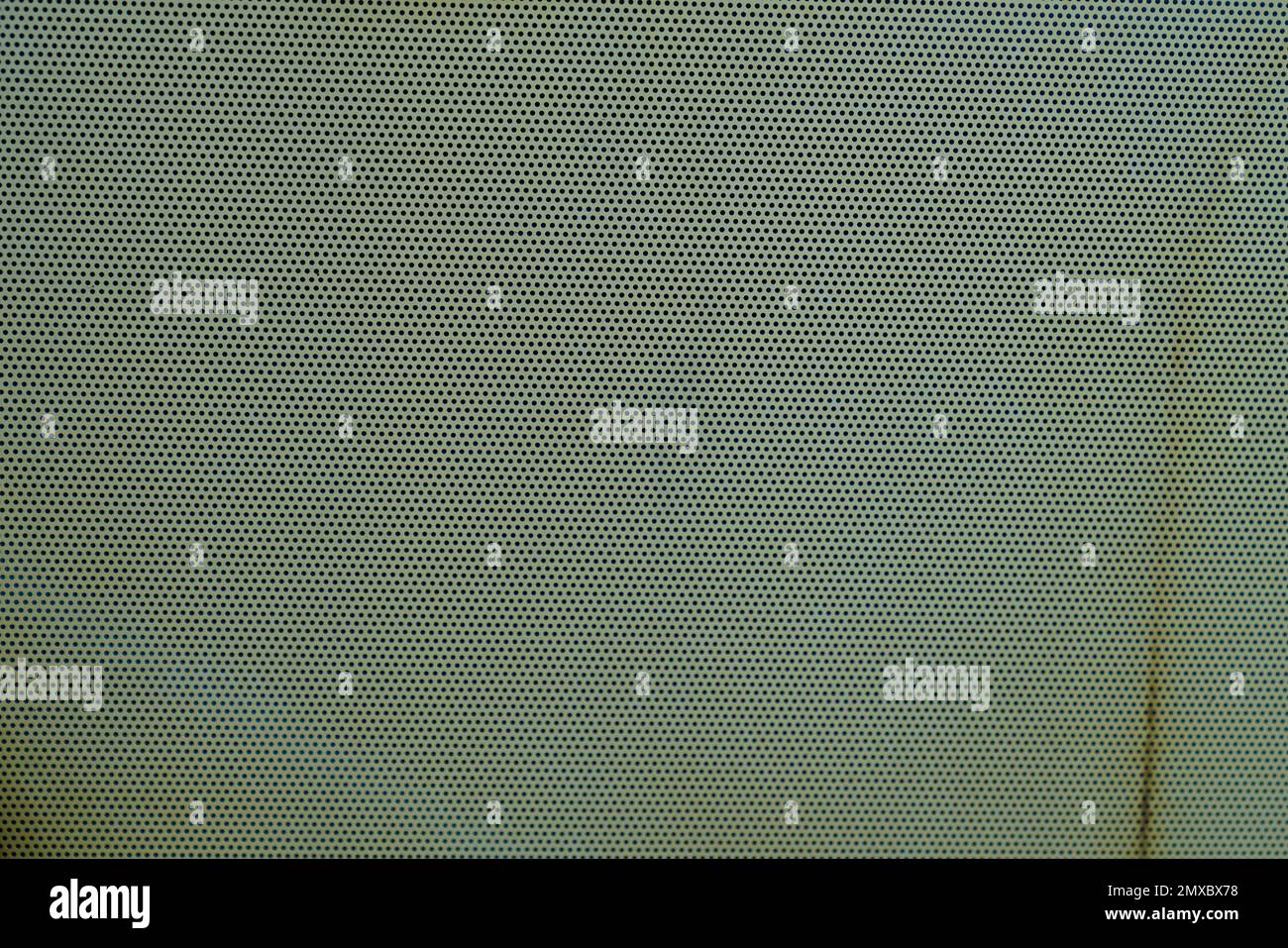 rust plank panel perforated green metal background with lots of holes ...