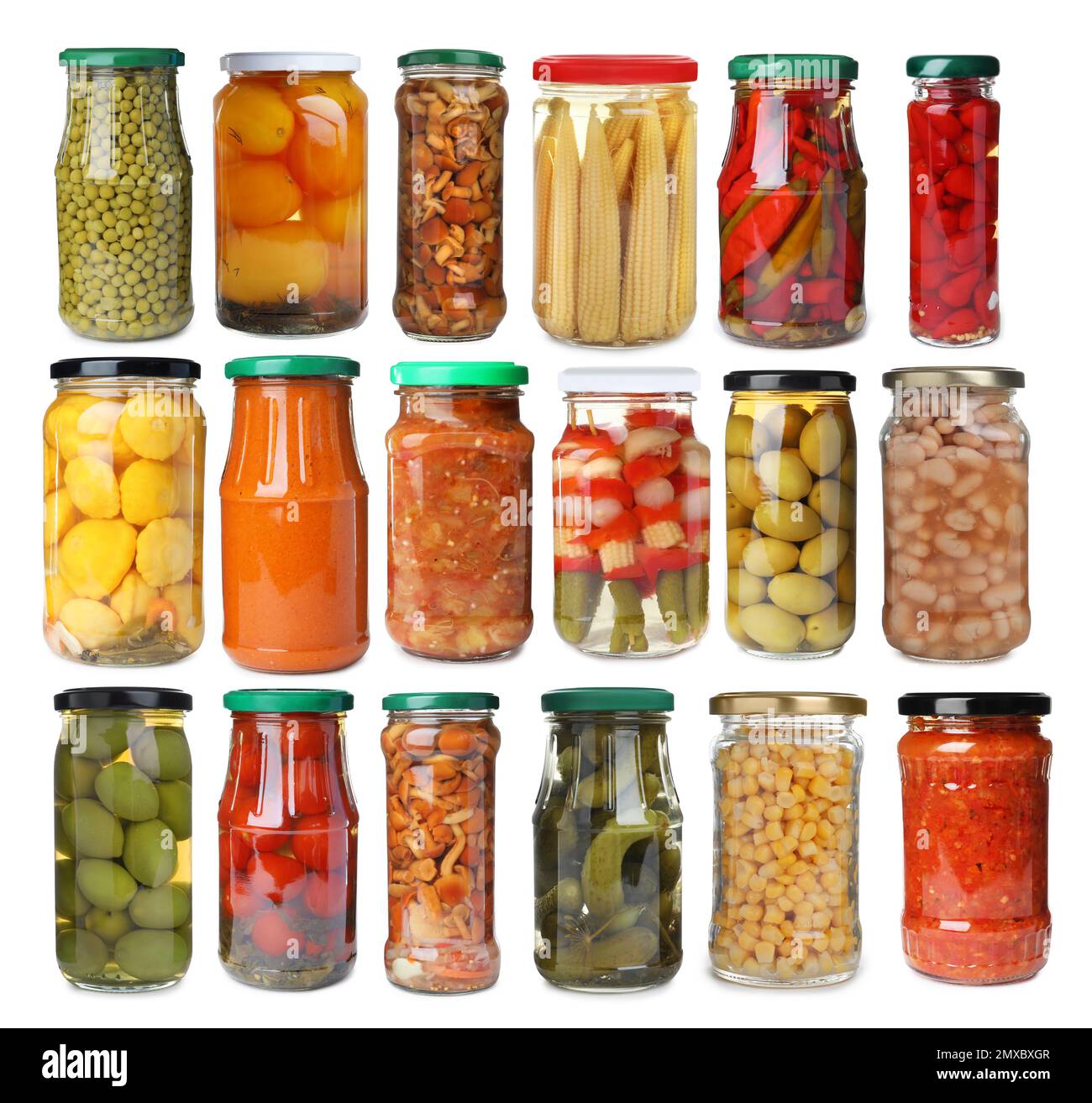 Set of jars with pickled vegetables, sauces and mushrooms on white ...