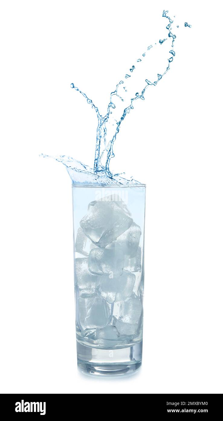 Water splashing out of glass with ice cubes on white background. Refreshing drink Stock Photo ...
