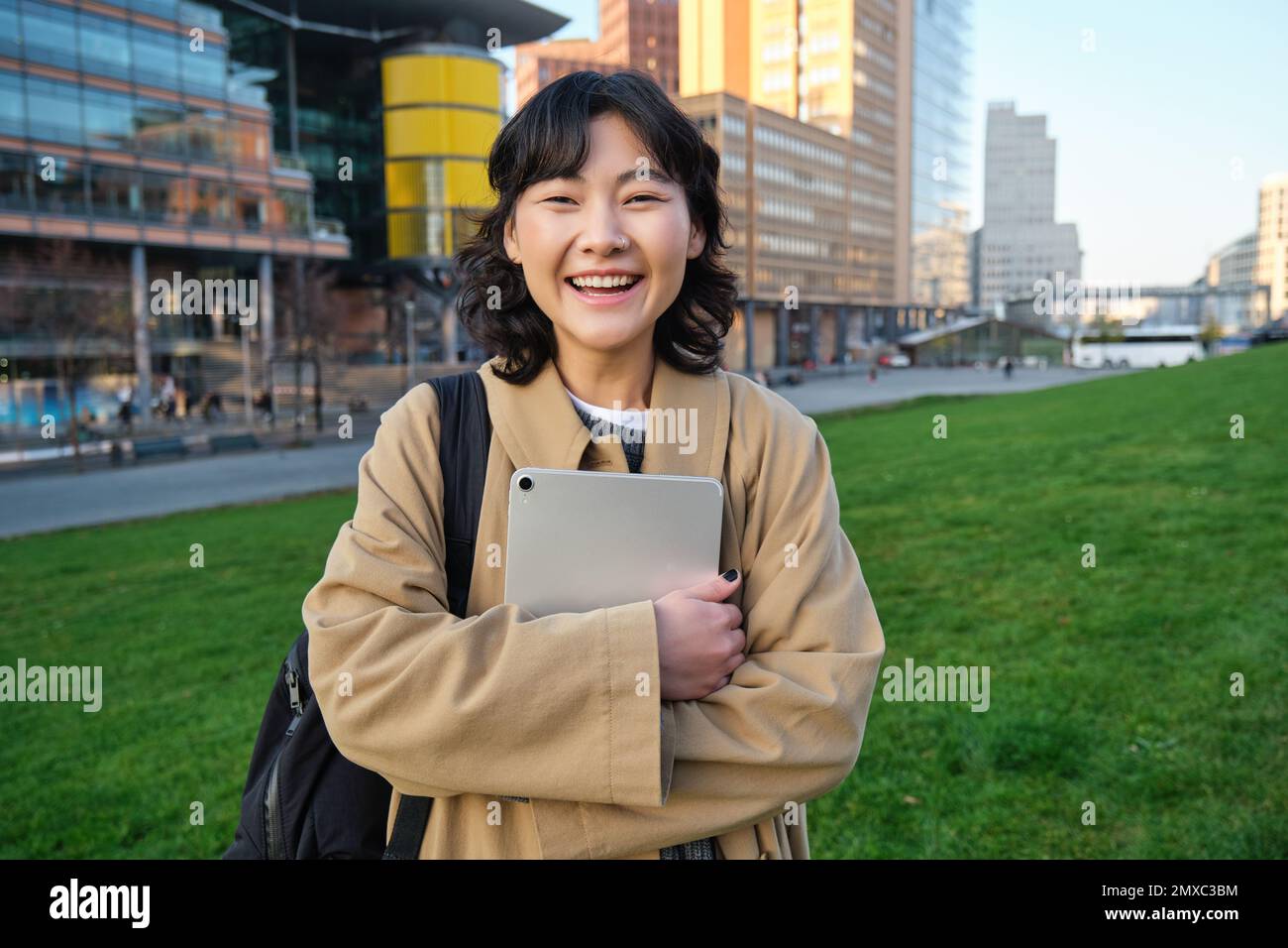Image of korean girl with happy face, walks around town with student ...