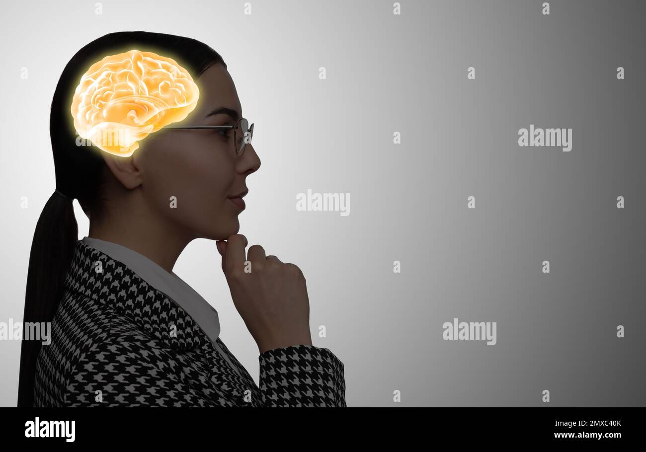 Thinking concept, space for text. Young woman and illustrated brain on ...