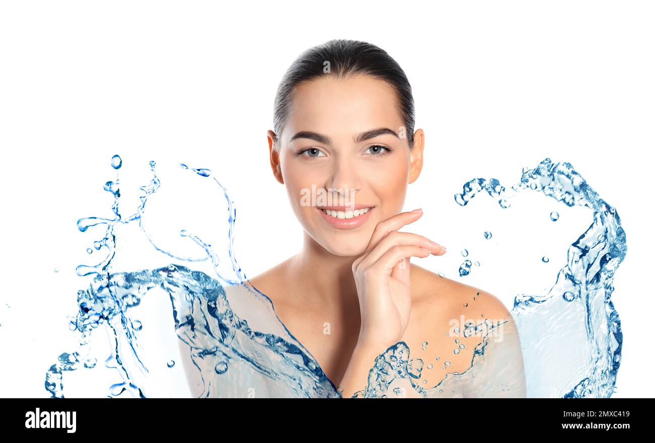 Beautiful woman with perfect skin and splash of clear water on white ...