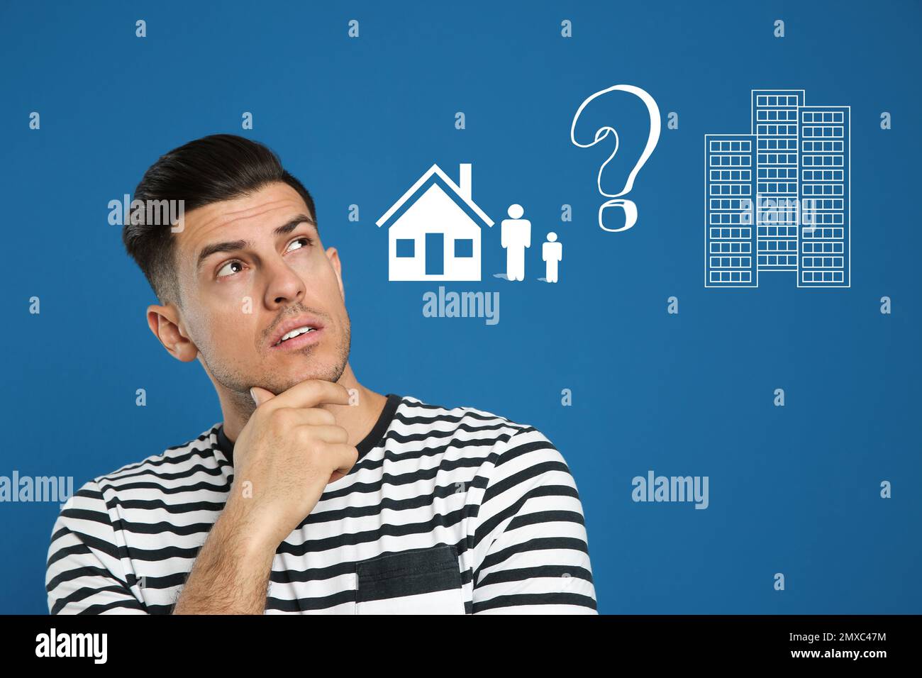 Life balance. Thoughtful man making choice between family and work ...