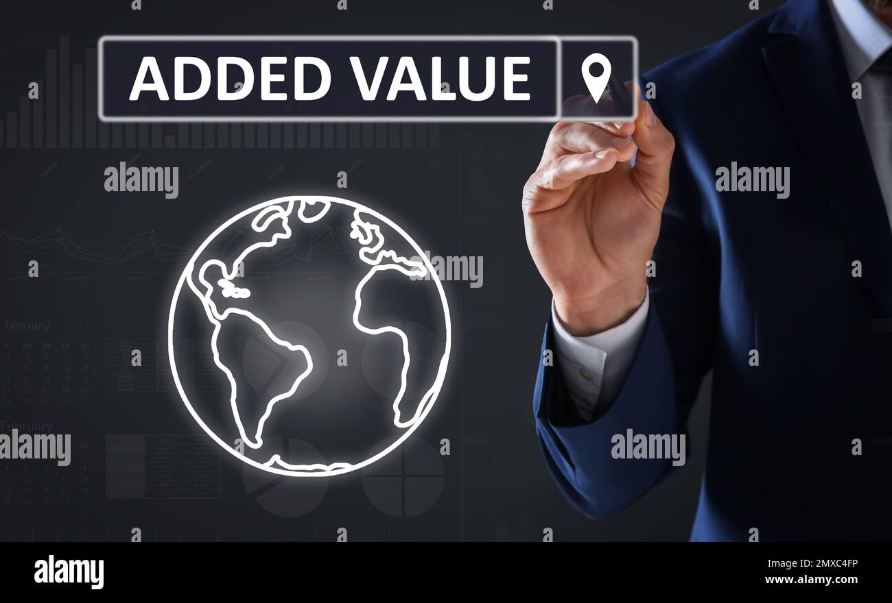 Added value concept. Businessman using virtual screen Stock Photo - Alamy