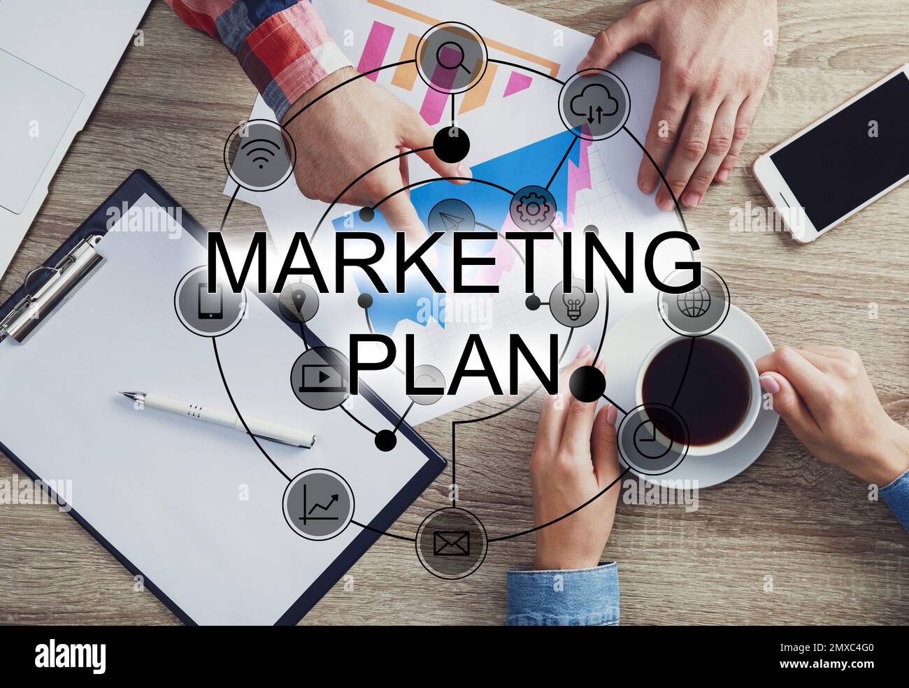 Digital marketing plan. People working at table in office, top view ...
