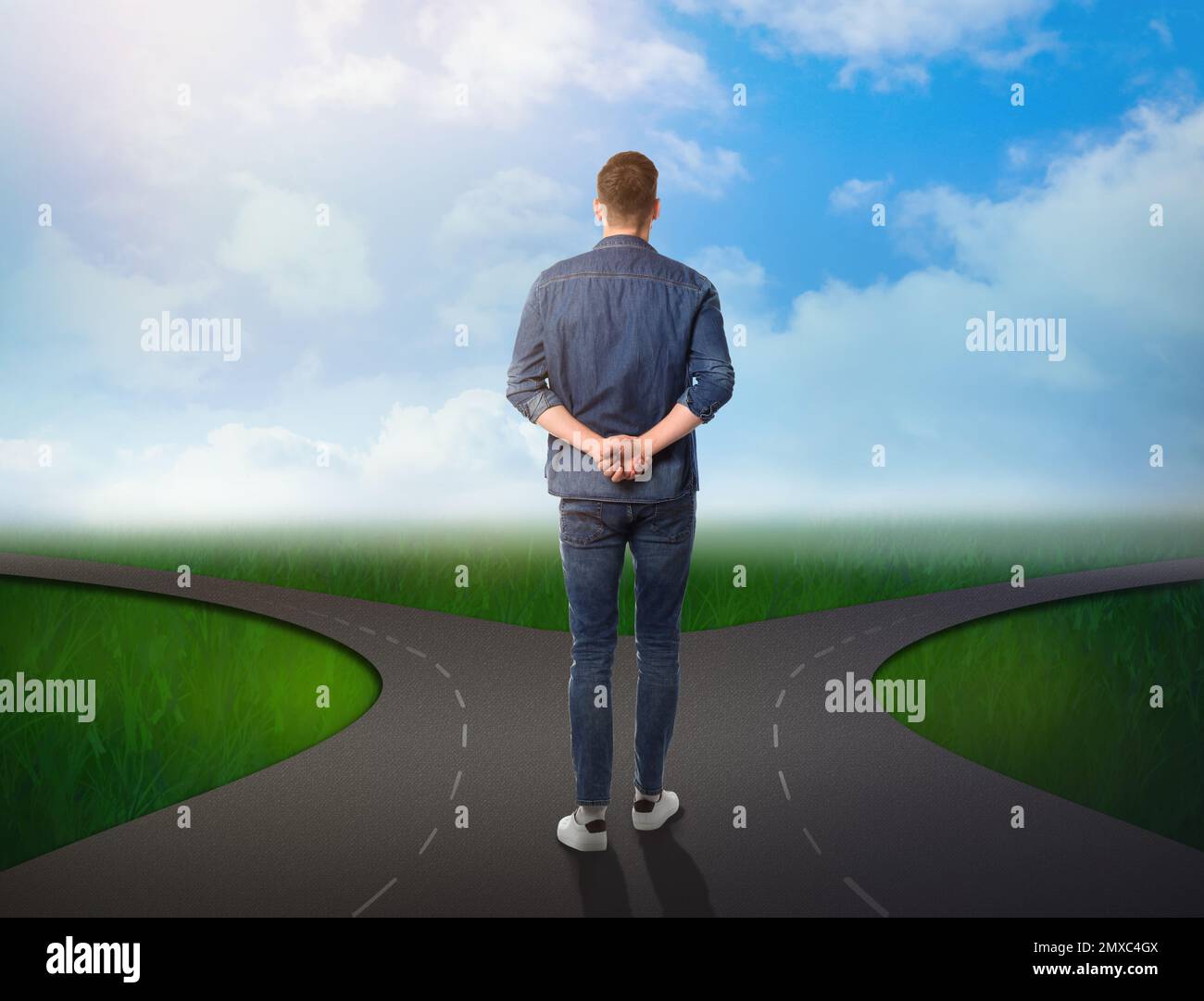 Choose your way. Man standing at crossroads taking important decision ...