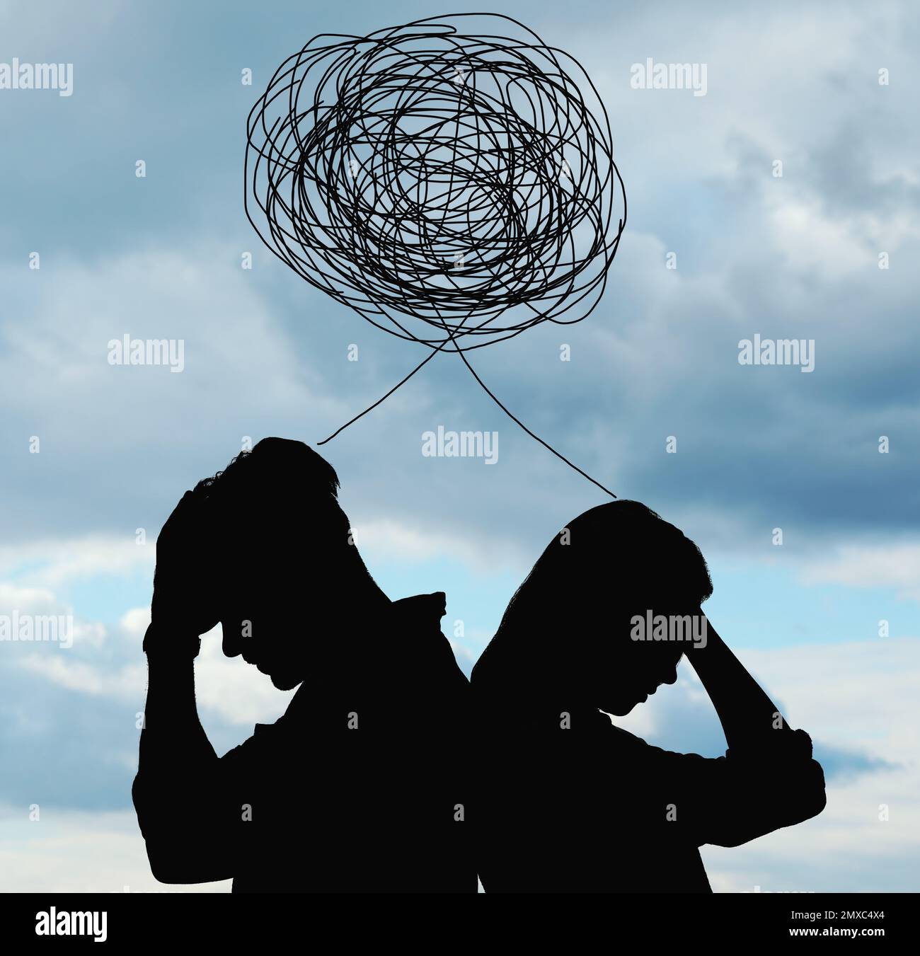 Silhouettes of arguing couple against cloudy sky. Relationship problems ...