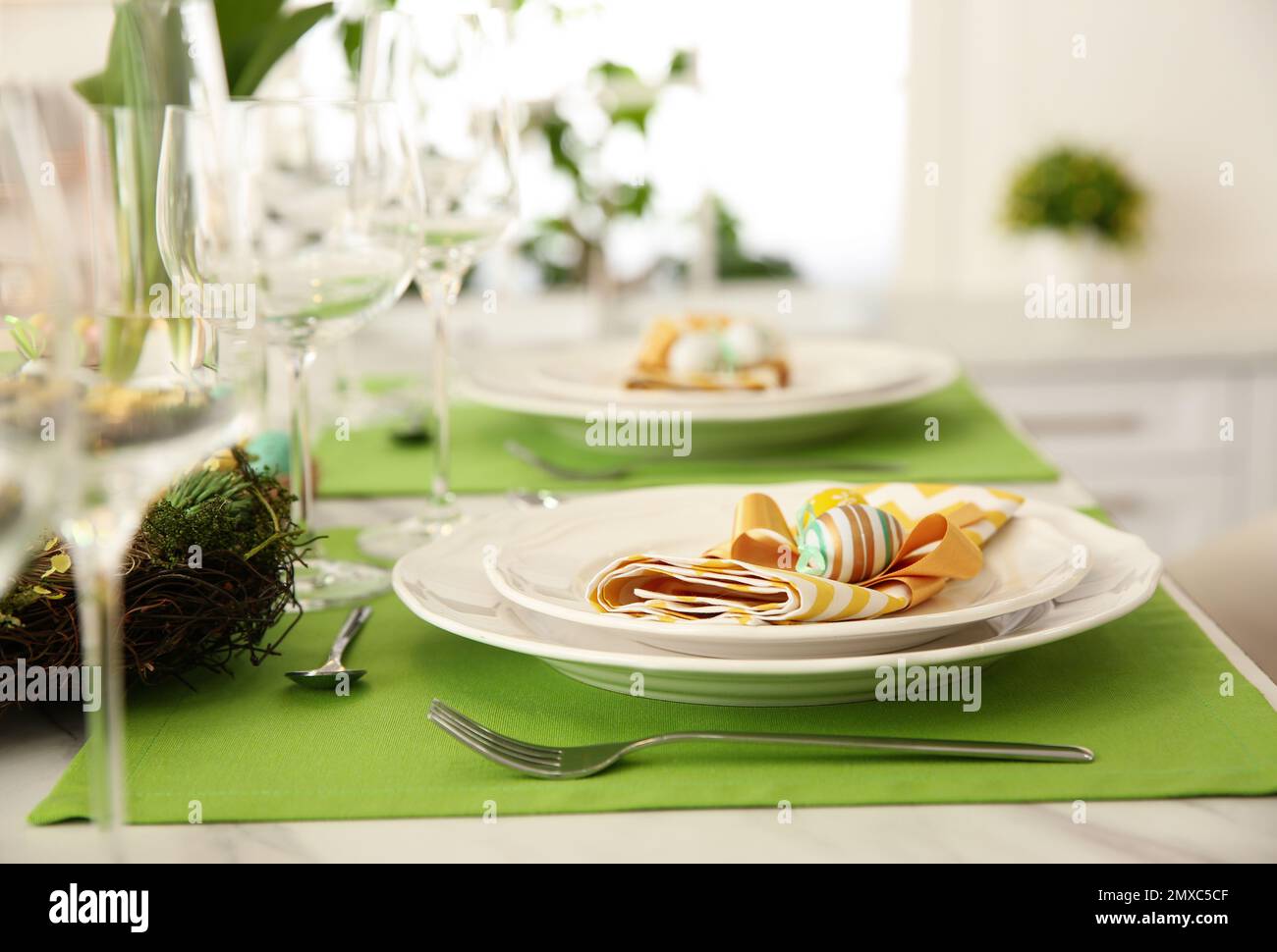 Beautiful festive Easter table setting with eggs Stock Photo - Alamy