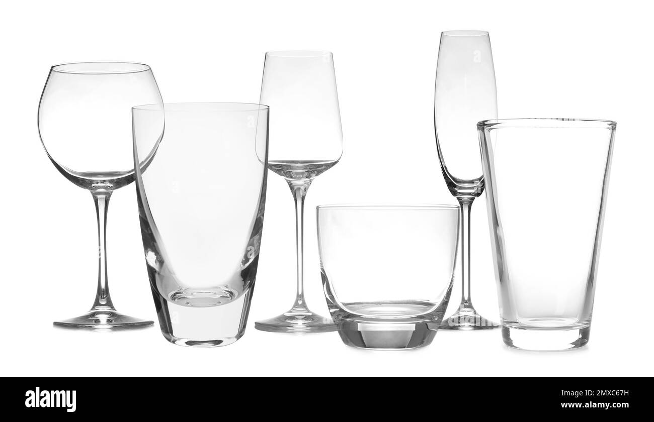 Set of empty glasses on white background Stock Photo - Alamy