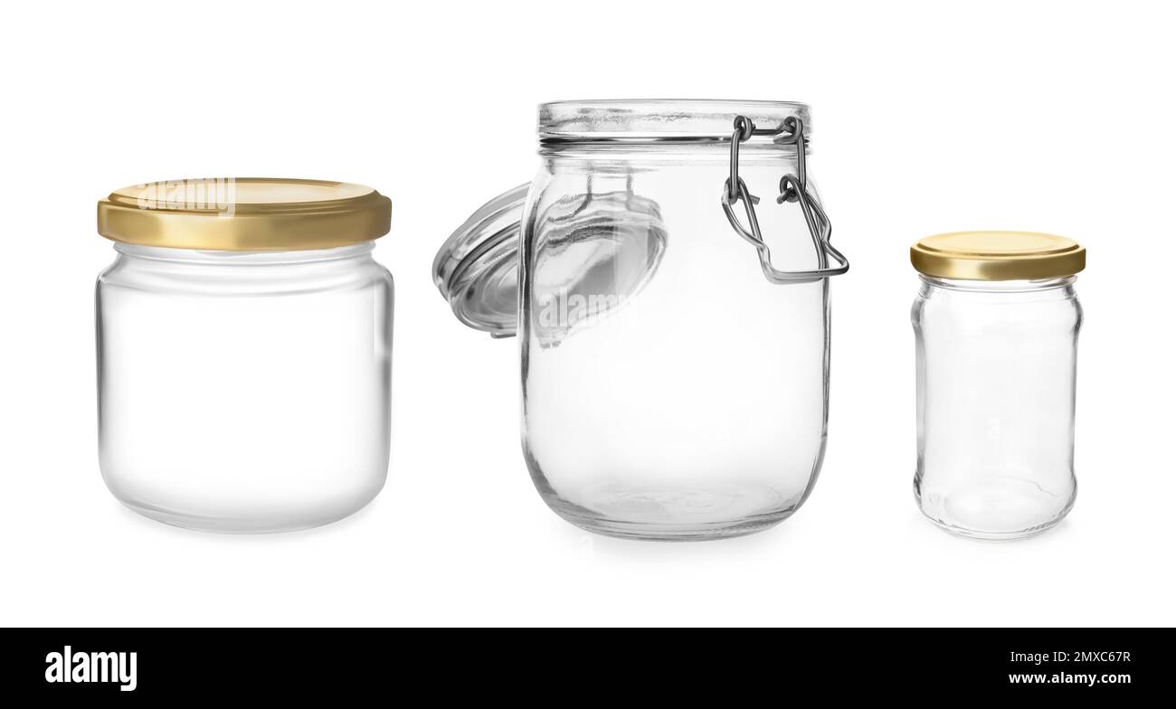 Set with different empty glass jars on white background Stock Photo - Alamy