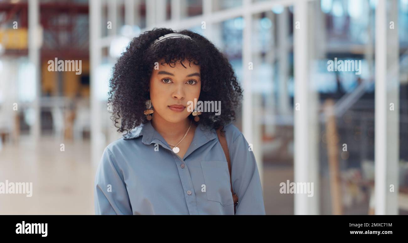 Creative black woman, face and arms crossed for vision, career ambition or empowerment at the ...