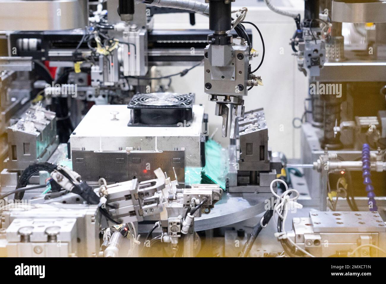 KUNSHAN, CHINA - FEBRUARY 2, 2023 - self-feeding injection molding ...