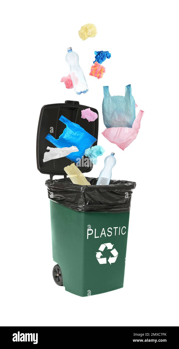 Different plastic garbage falling into trash bin. Waste management and ...