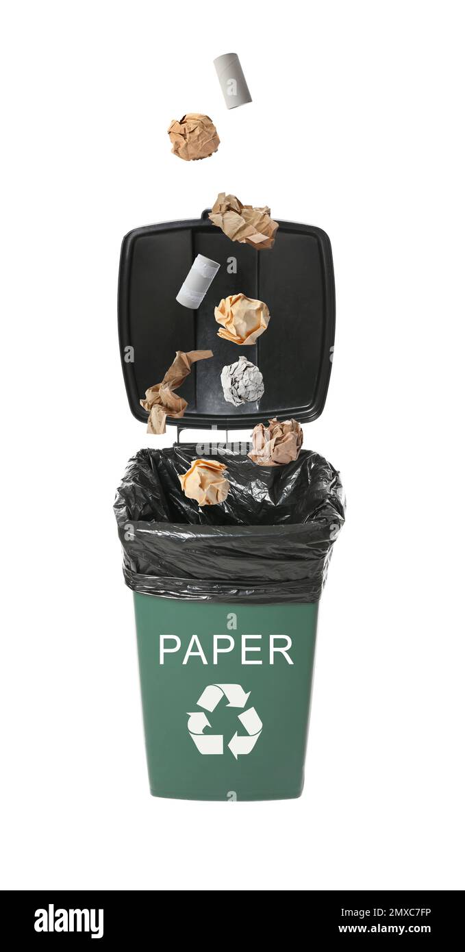 Different paper garbage falling into trash bin. Waste management and ...