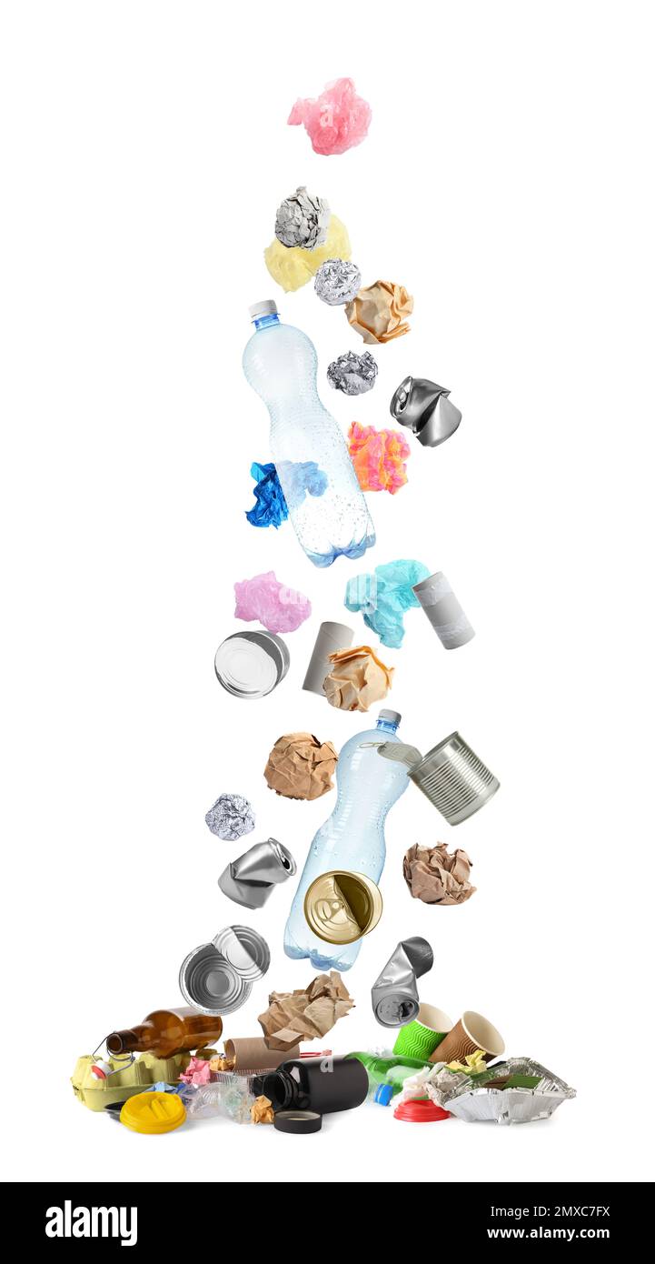 Different garbage falling into pile on white background. Waste ...