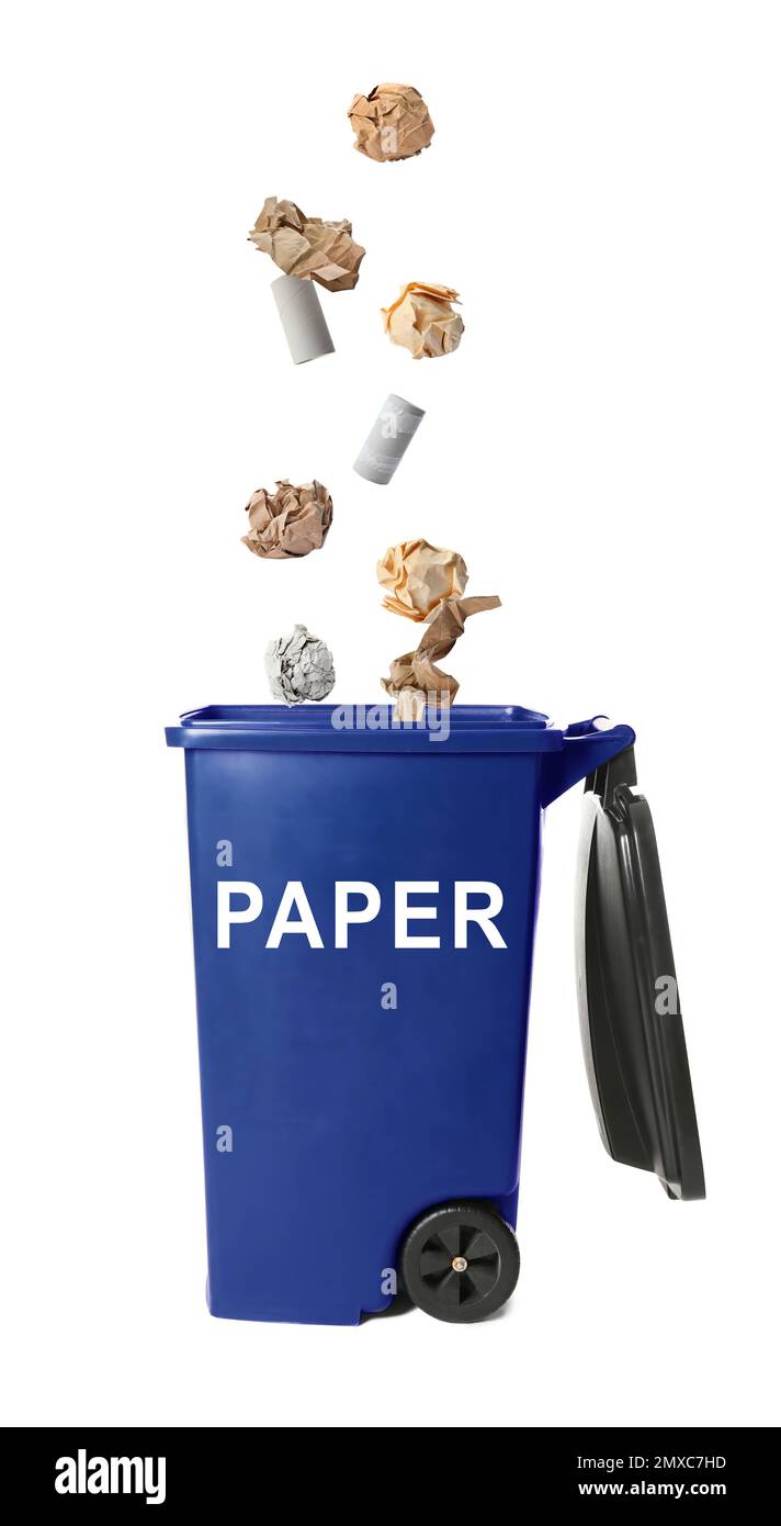 Different paper garbage falling into trash bin. Waste management and ...