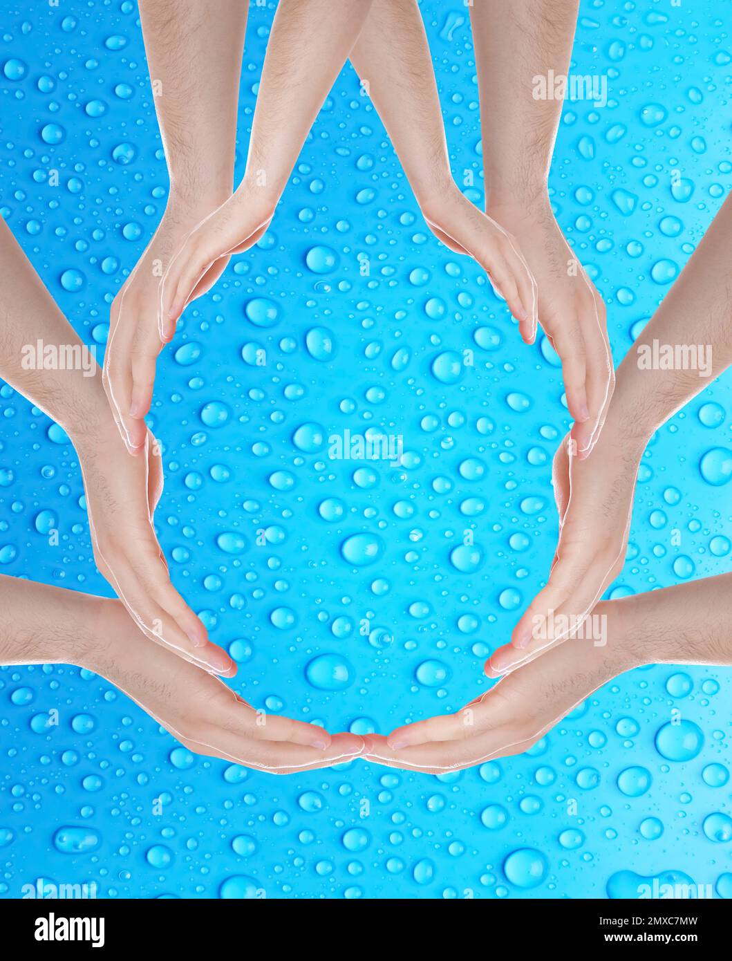 Men forming water drop with their hands on blue background. Ecology ...